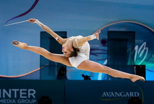 Rhythmic Gymnasts Seem To Defy Physics Photo 1 Pictures Cbs News