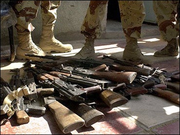 Iraq Militants Trade Guns For Cash - CBS News