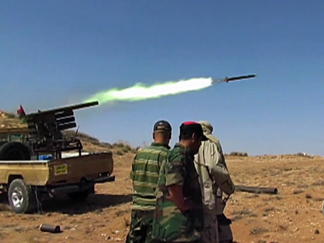 Libyan rebels fight fire with fire - CBS News