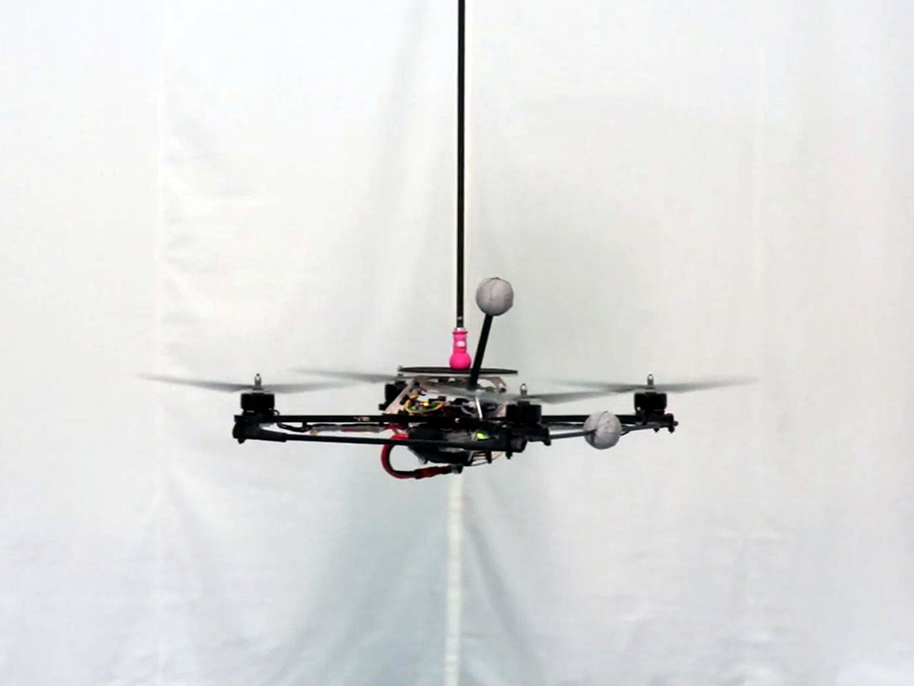 Watch: Flying robots perform pole acrobatics - CBS News