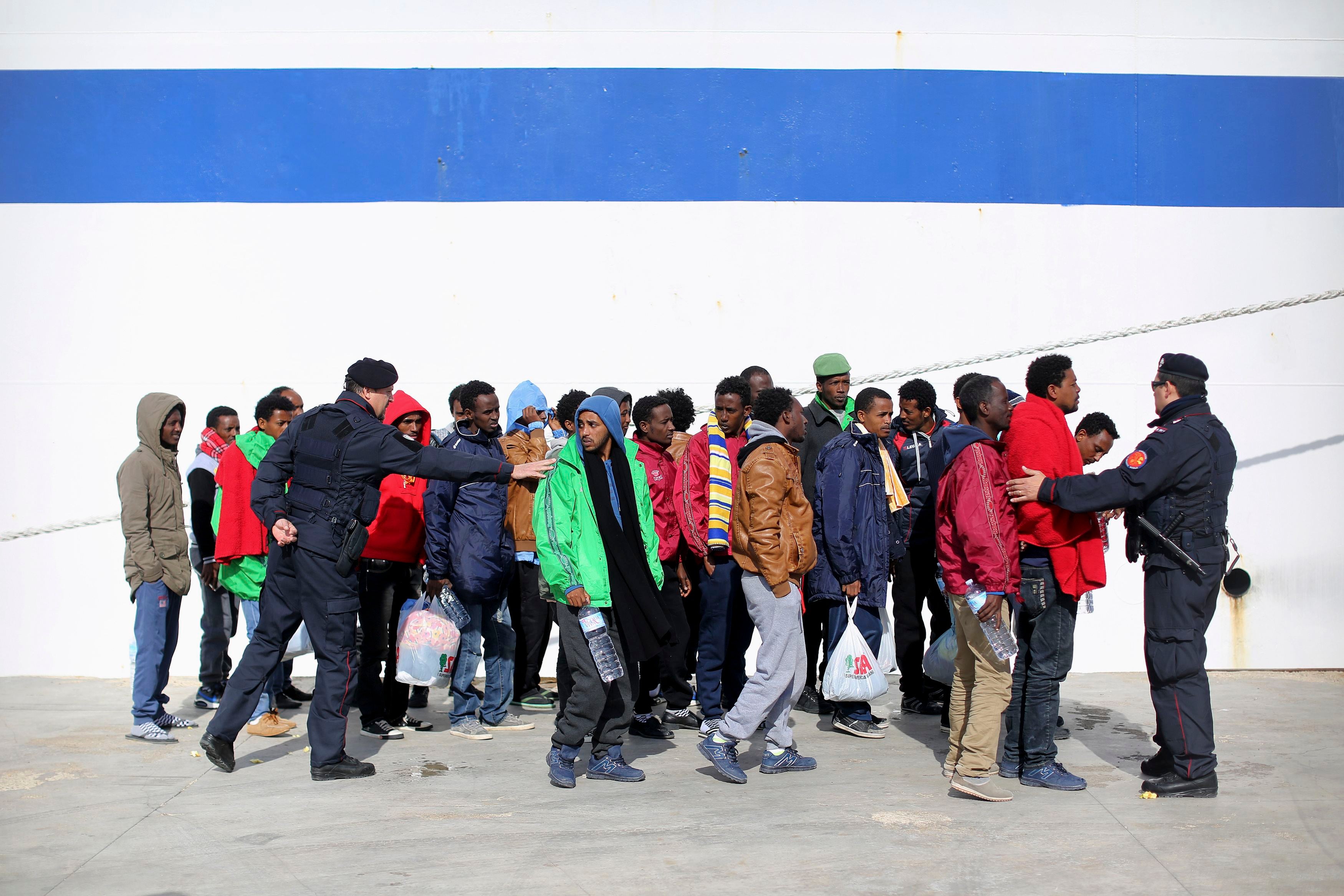 Italy rescues almost 1000 migrants near Libya in Mediterranean - CBS News