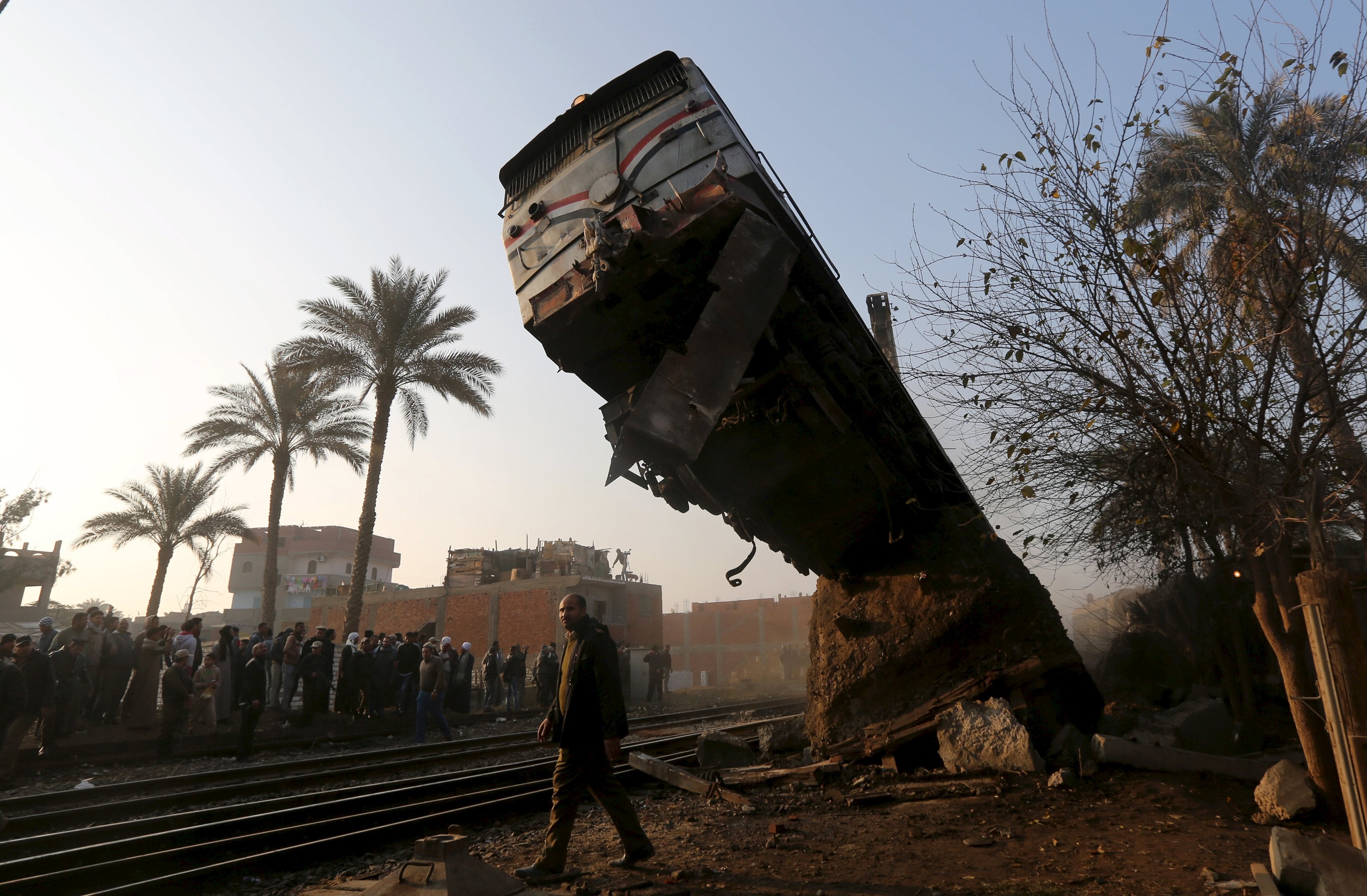 Egypt train derailment north of Cairo leaves dozens wounded - CBS News
