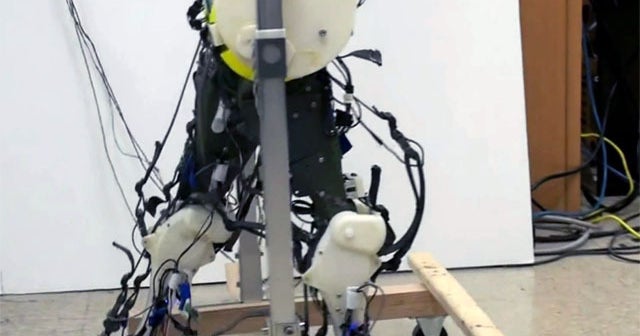 New robotic legs accurately mimic human walking - CBS News