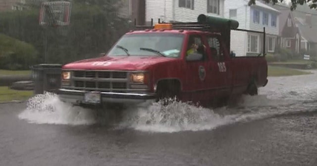 Flash floods wash over Rhode Island - CBS News