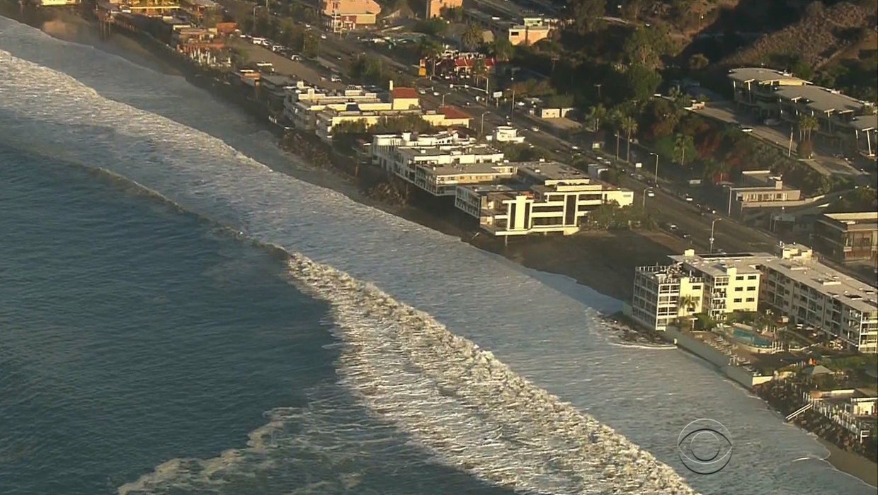 Wild waves pose danger in Southern California - CBS News