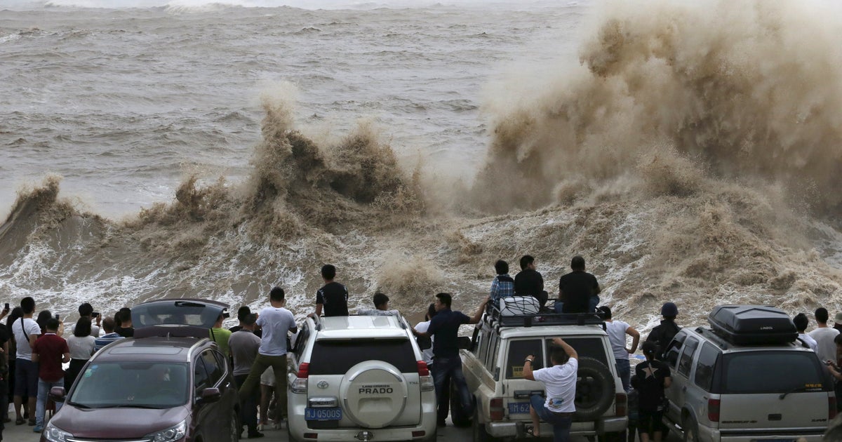 1.1 million evacuated as typhoon pounds China - CBS News