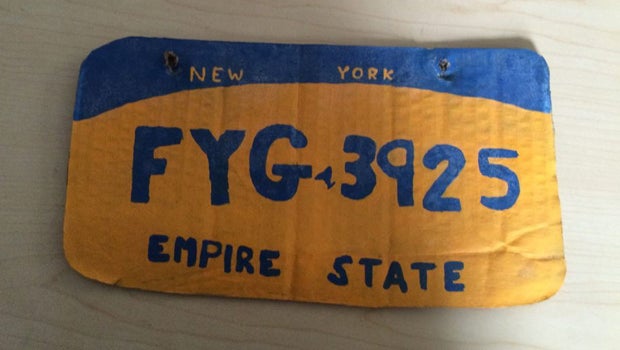 Felony charge after driver pulled over with phony license plate - CBS News