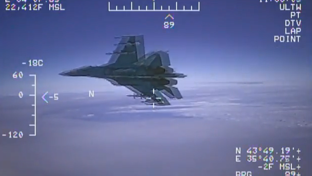 U.S. Navy releases video of "unsafe" Russian jet intercept - CBS News