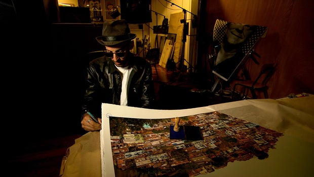 Larger than life displays by French photographer JR - CBS News