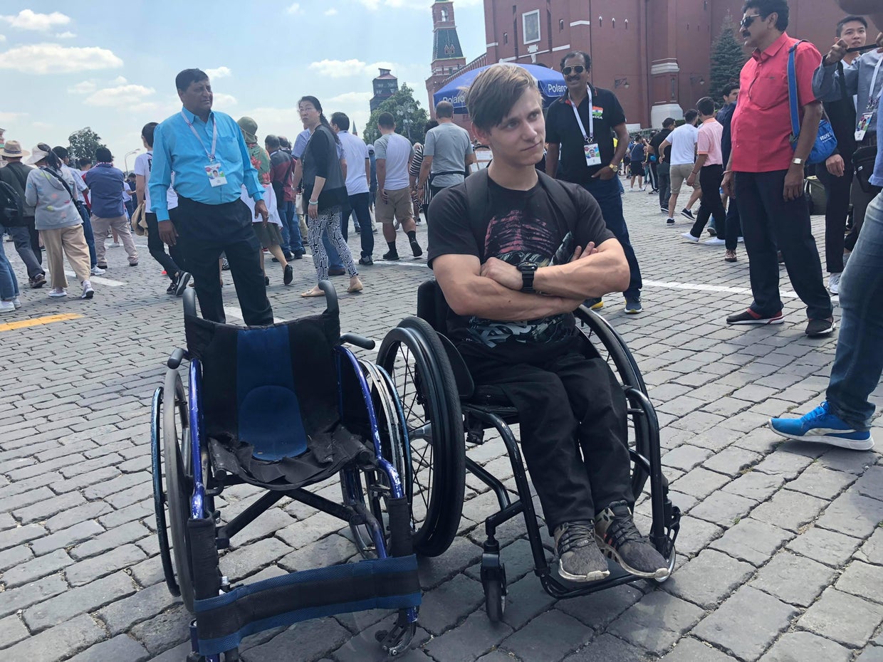 Paralyzed soccer fan donates wheelchair to Russian man during FIFA ...