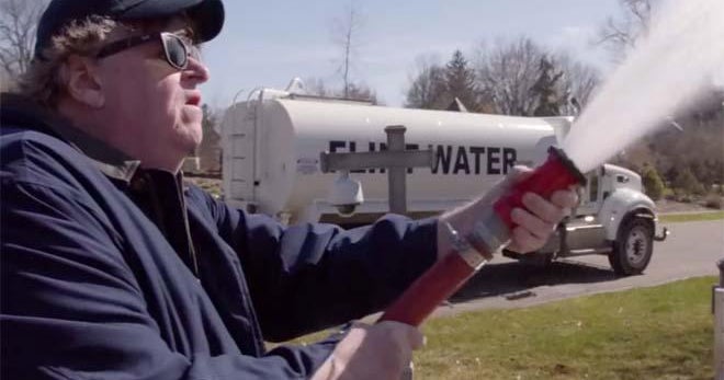 Review: Michael Moore takes fire hose to democracy's enemies in ...