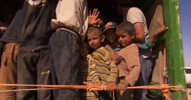 Fallout in Iraq intensifies refugee crisis in Jordan - CBS News